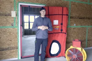 Blower Door Testing the Barndo, low numbers mean low operating costs